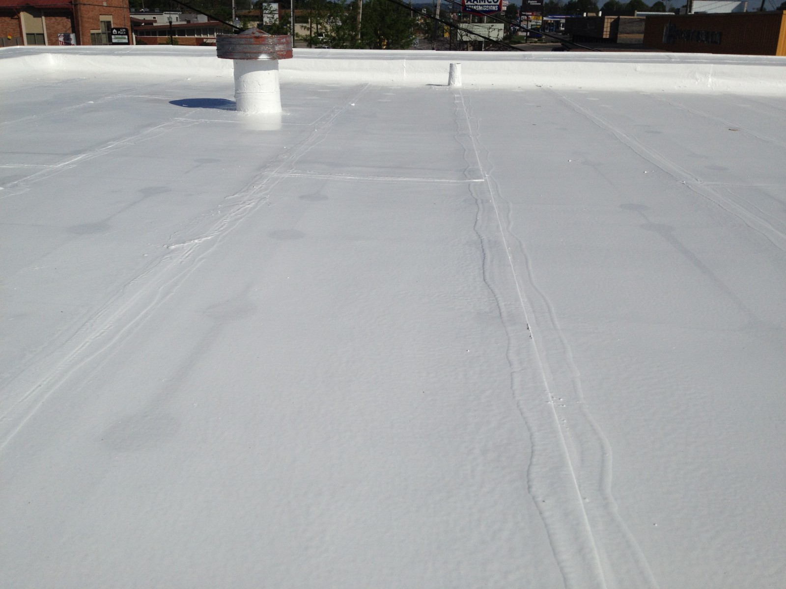 NY Flat Roofing: How Much Will It Cost Me To Coat My Roof?